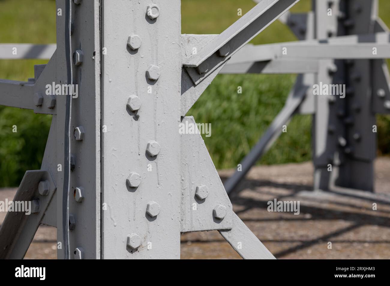 Close-up view of the steel truss of the electric pole connected by ...