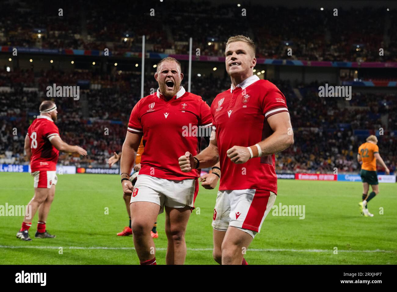 (L-R) Henry Thomas, Gareth Anscombe(WAL) celebrate at the end of the ...