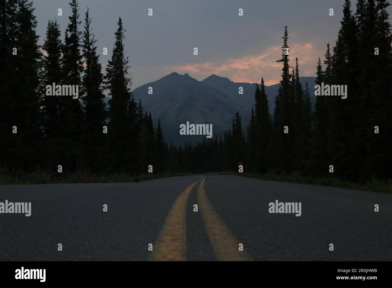Low Angle Road Photo Looking Towards Mountain After Sunset Stock Photo ...