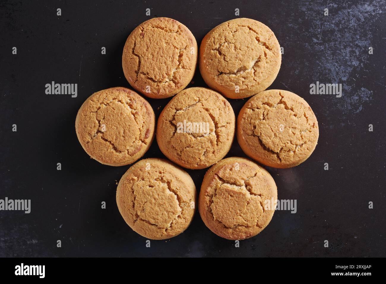 Homemade oatmeal cookies over old black metal tray background, top view ...