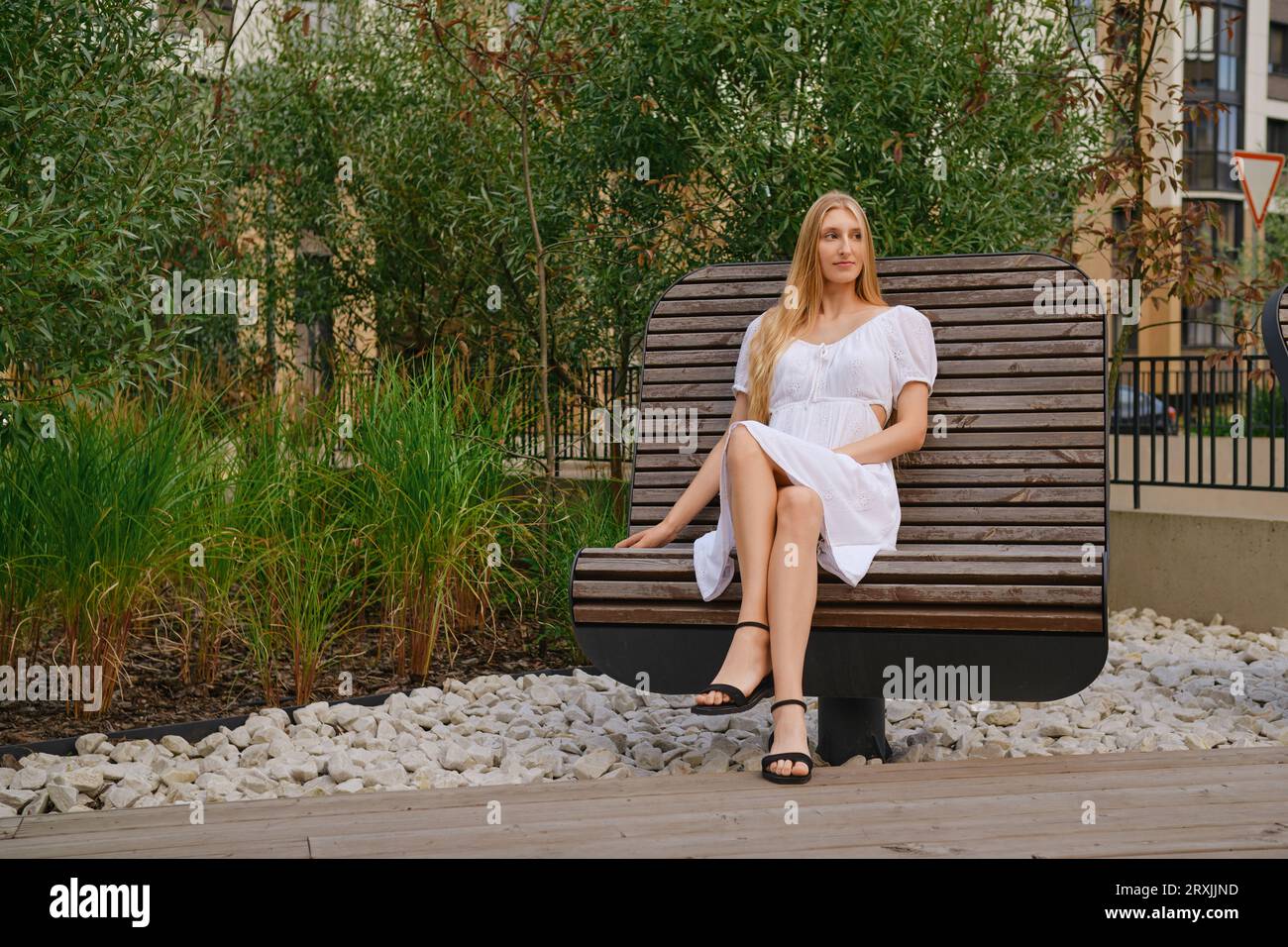 Leg woman sitting on bench hi-res stock photography and images - Alamy
