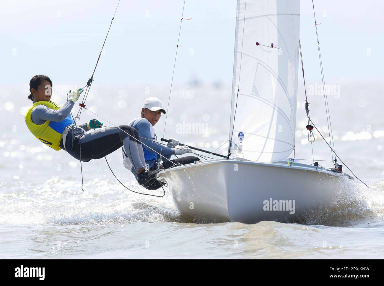 Japan's Keiju Okada (R) and Miho Yoshioka compete in the sailing mixed ...