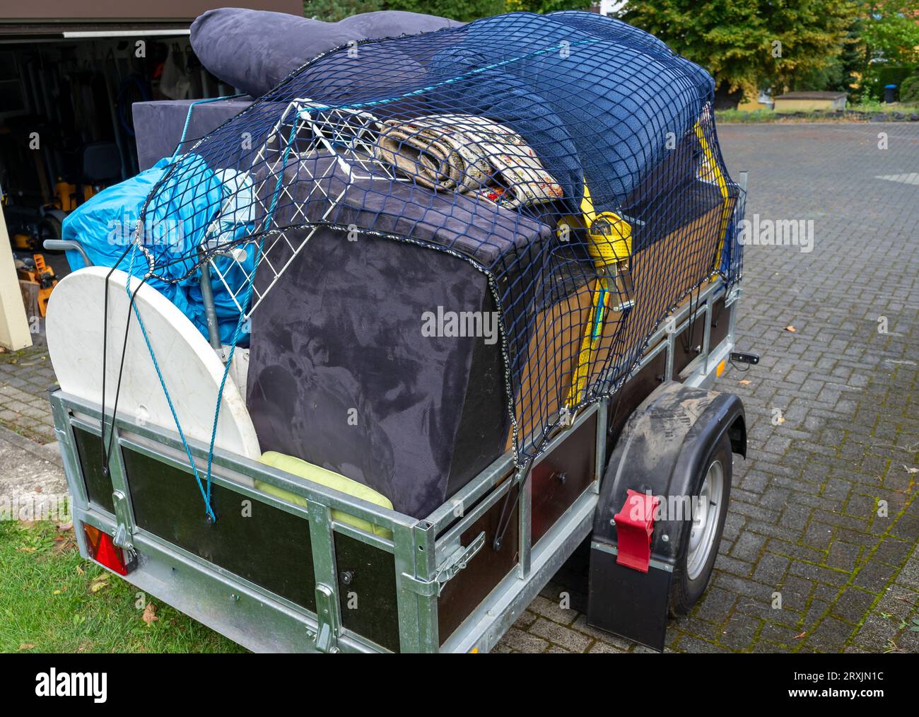 Bulky waste on a trailer Stock Photo - Alamy