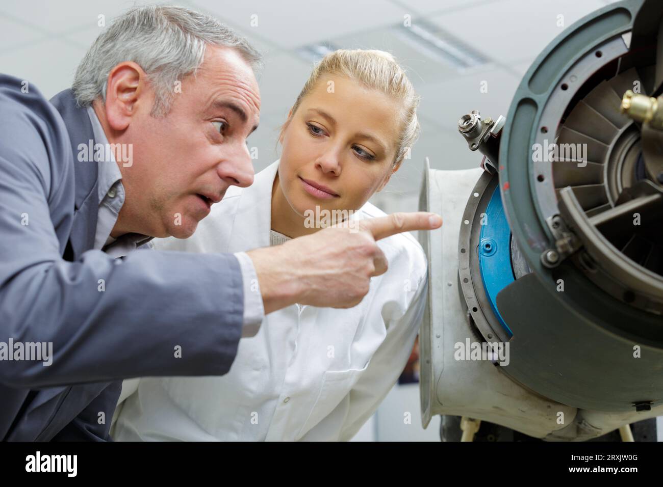 Man woman repairing aircraft hi-res stock photography and images - Alamy