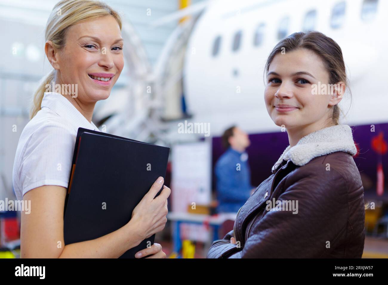 portrait of a female pilot with instructor Stock Photo - Alamy