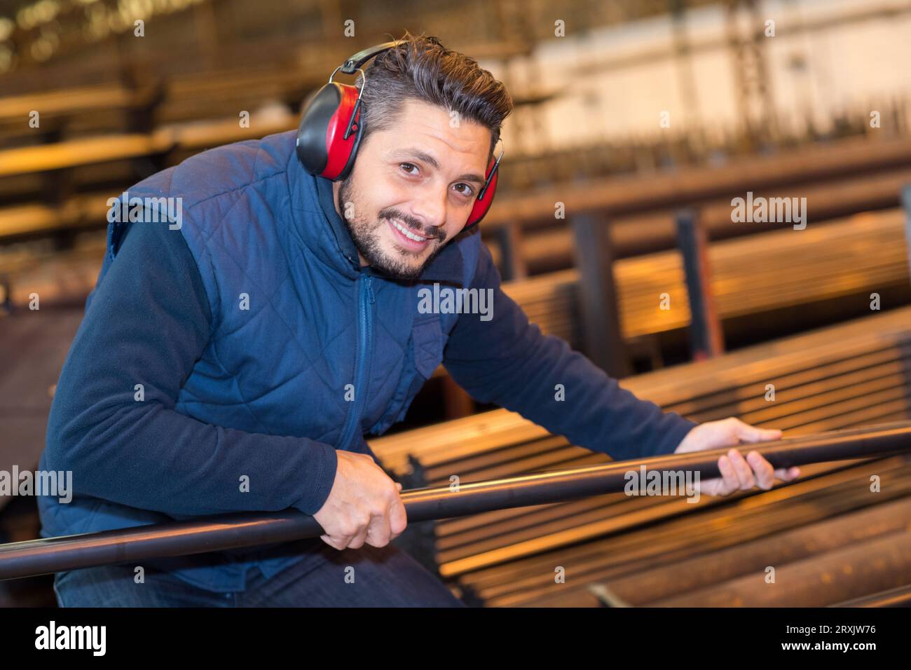 Holding metal tube hi-res stock photography and images - Alamy