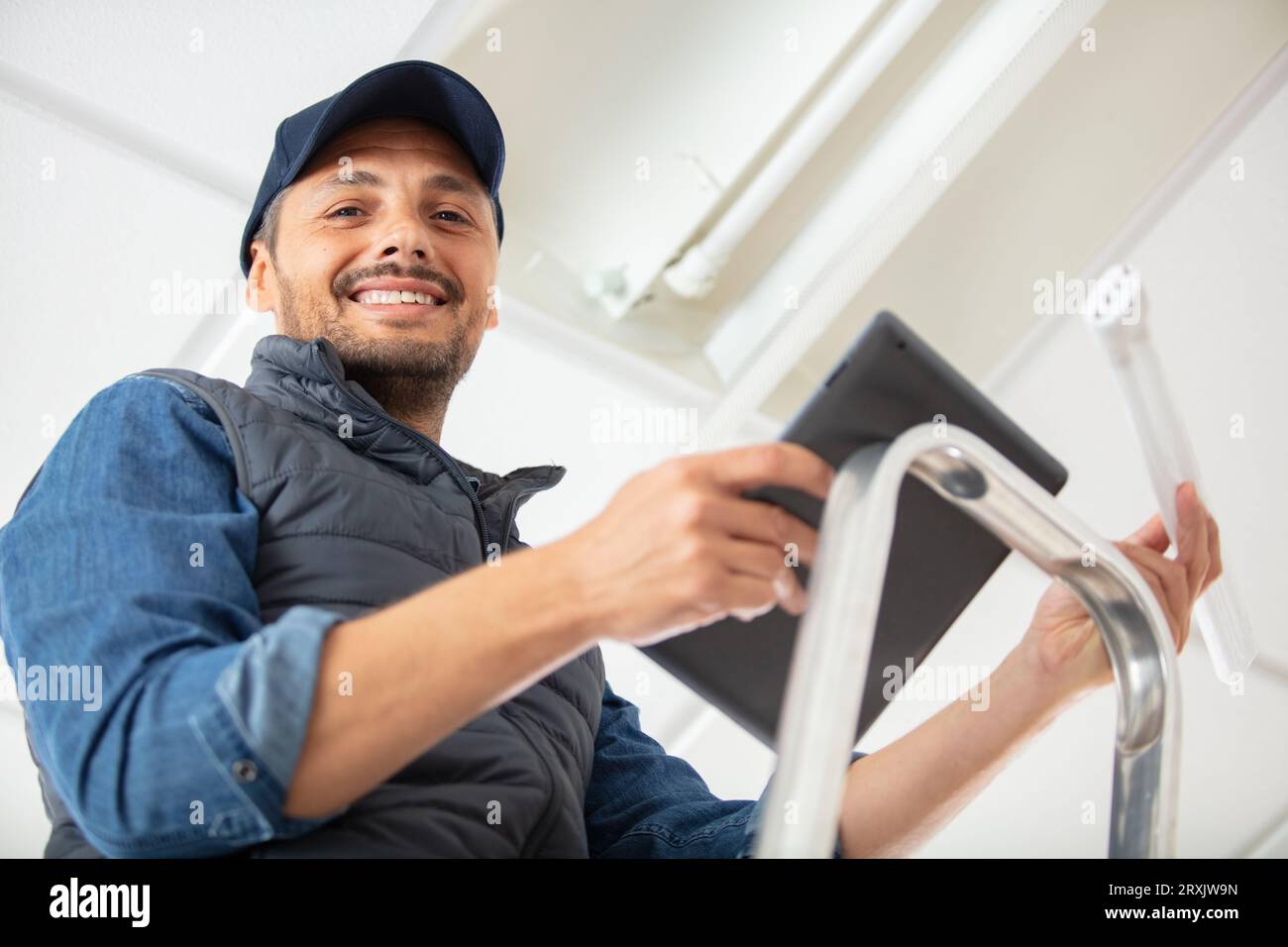 Person reading instruction manual hi-res stock photography and images ...