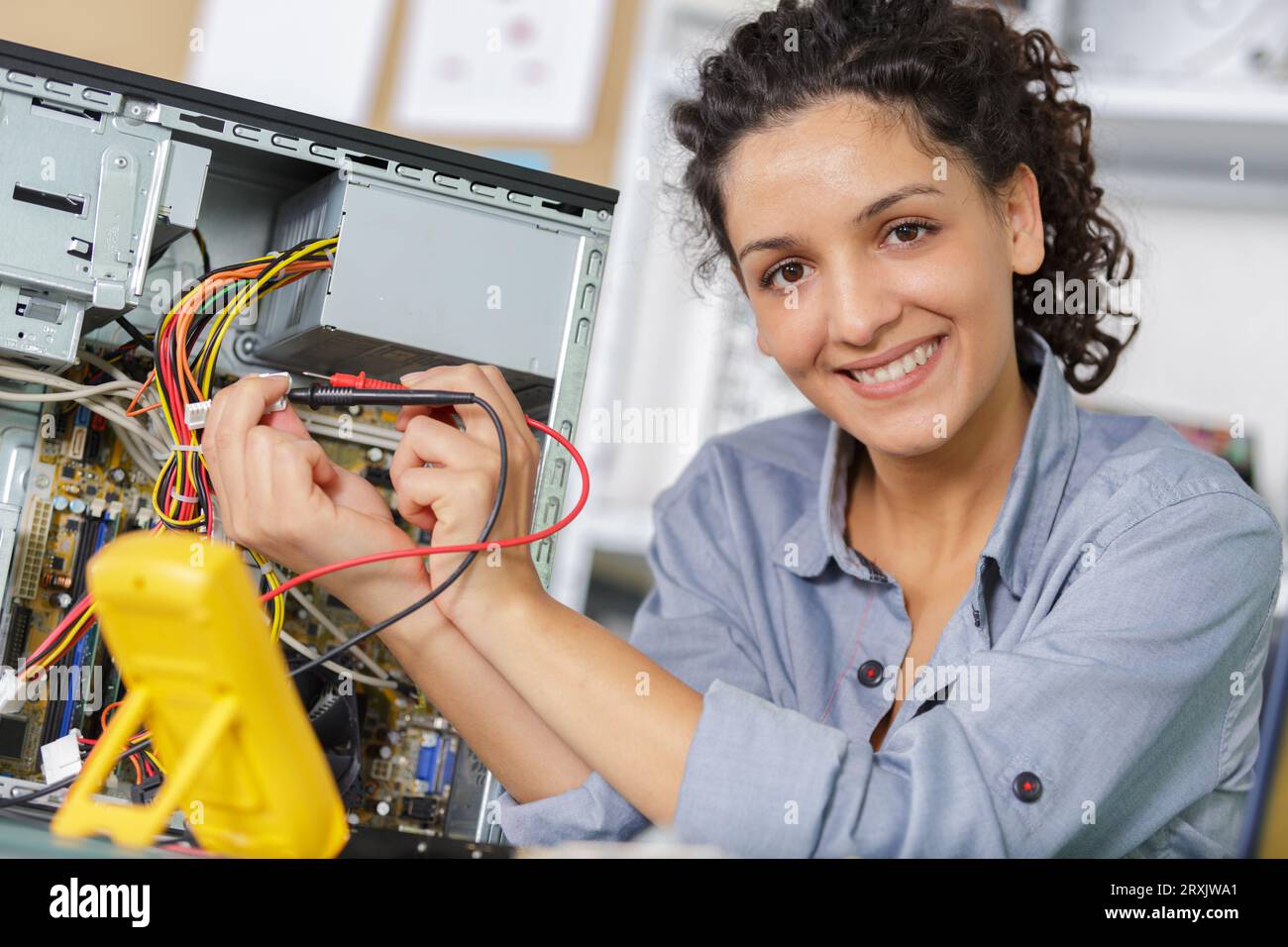 a female worker calibrating pc Stock Photo - Alamy