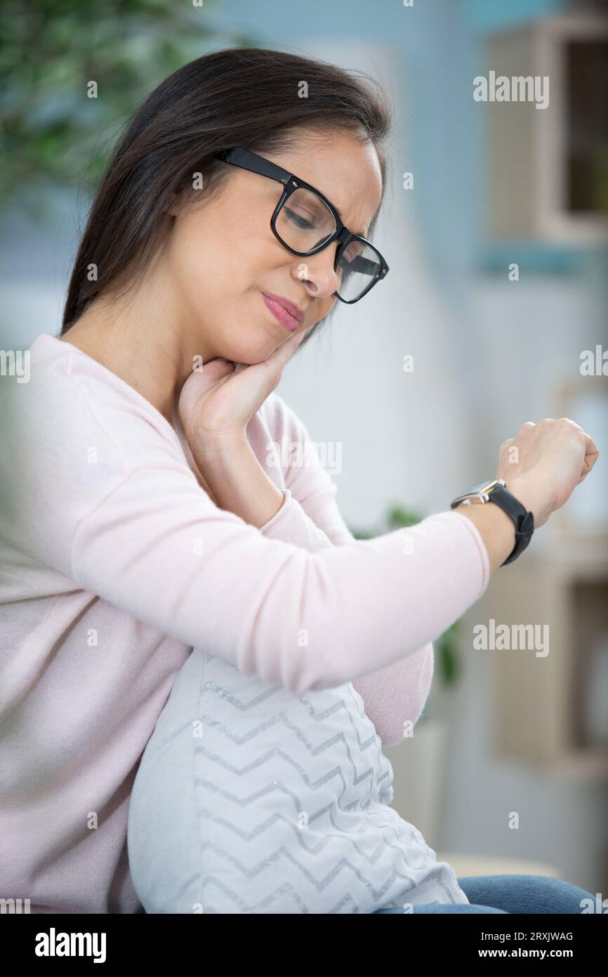Late to class looking at watch hi-res stock photography and images - Alamy