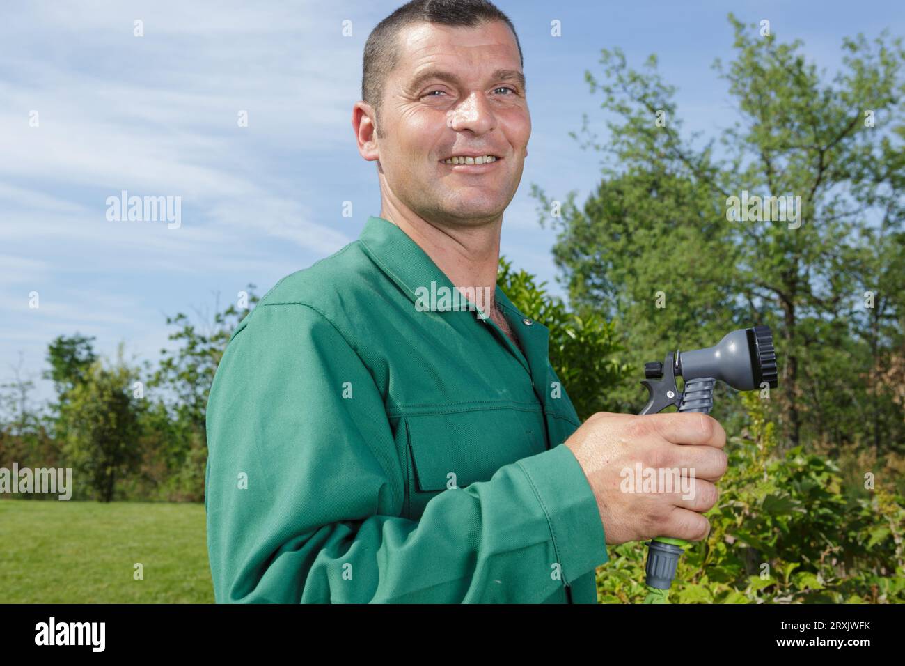 Male gardener rear view hi-res stock photography and images - Alamy