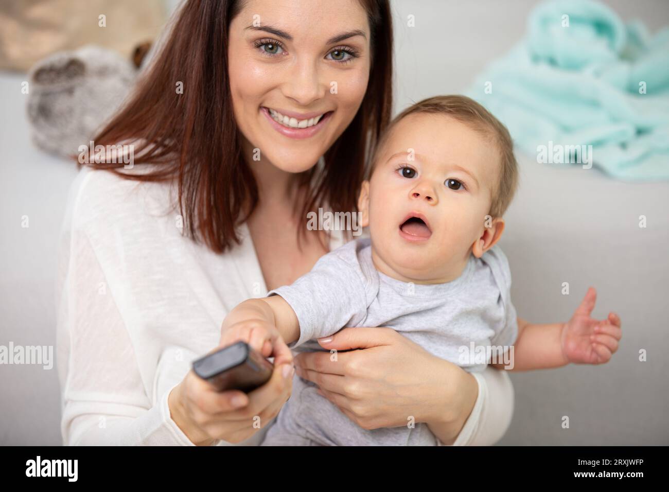 Toddler watching television hi-res stock photography and images - Alamy
