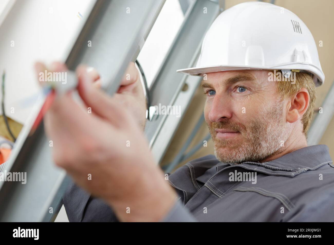 builder fixing up the framework Stock Photo - Alamy