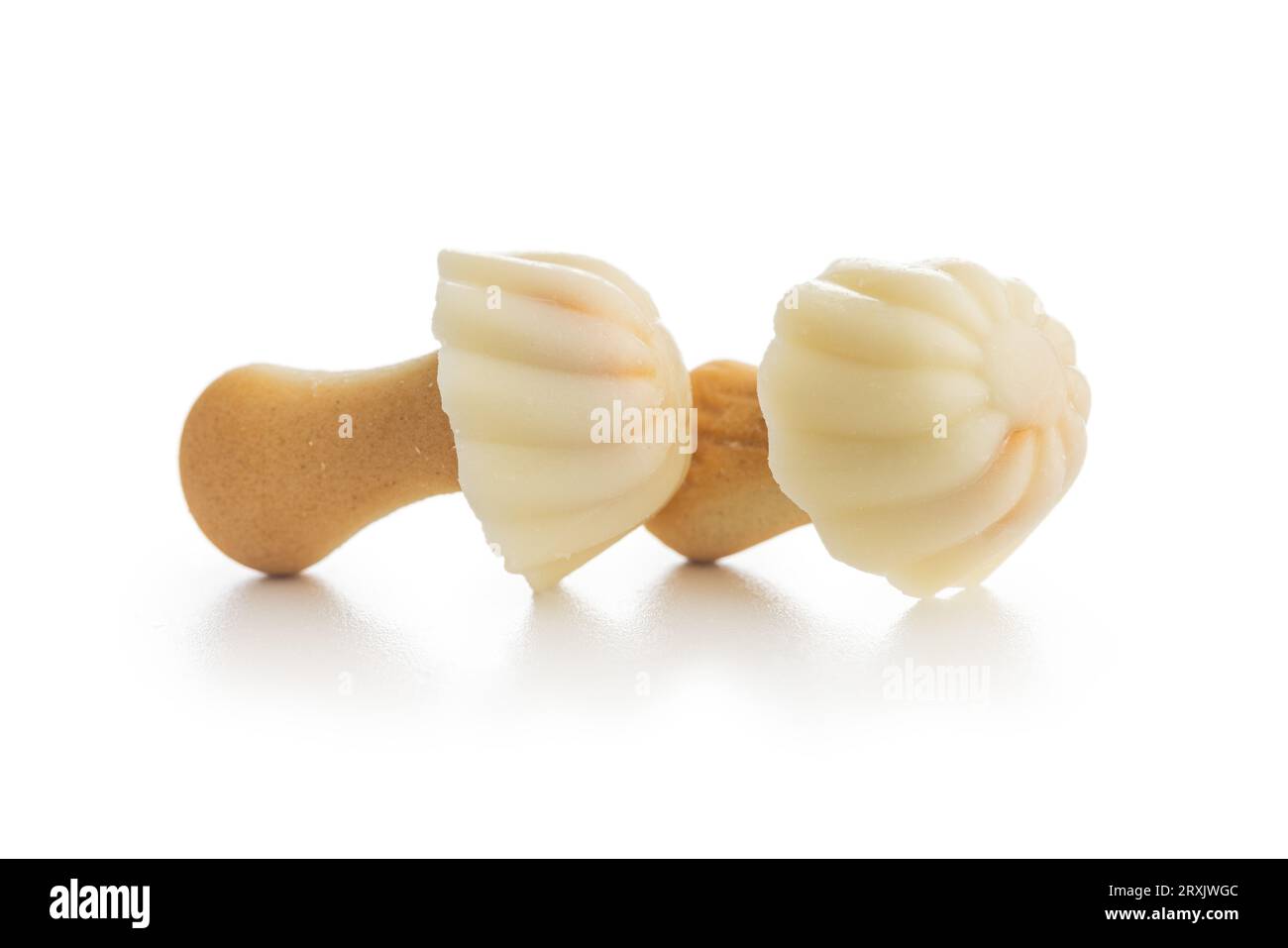 Candy in the shape of a mushroom. White chocolate mushrooms isolated on ...