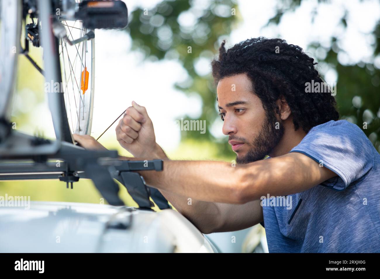 Loading a bike hi-res stock photography and images - Alamy