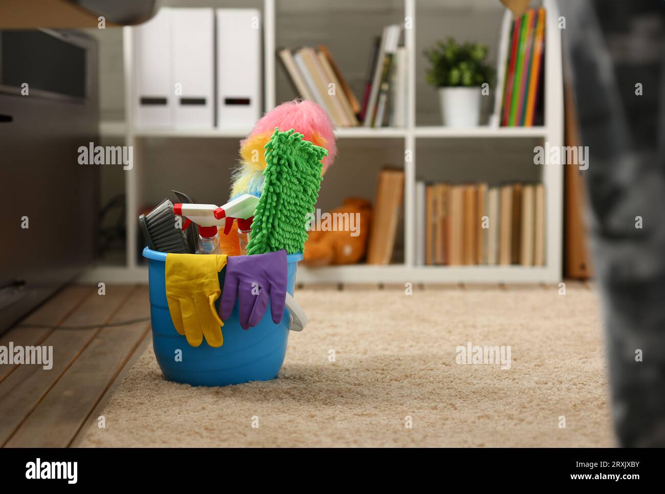 A bucket with cleaning equipment stands Stock Photo - Alamy
