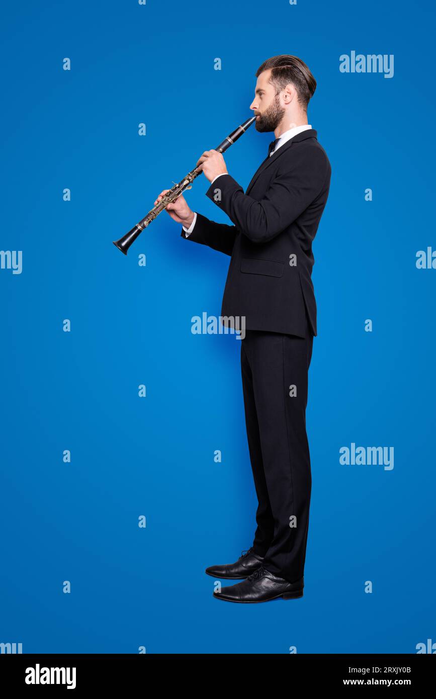 Side view half face, full size fullbody portrait of stylish talented ...