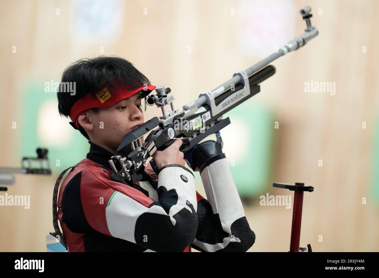 Singapore's Tang Hong An competes in 10m air rifle shooting qualifying ...