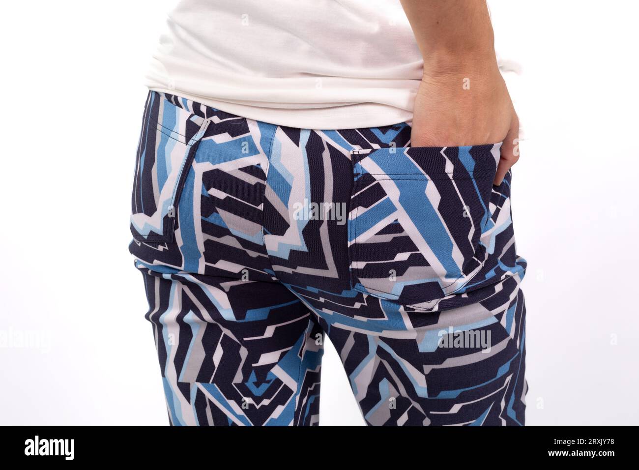 A close-up image captures a woman's hands comfortably tucked into the ...