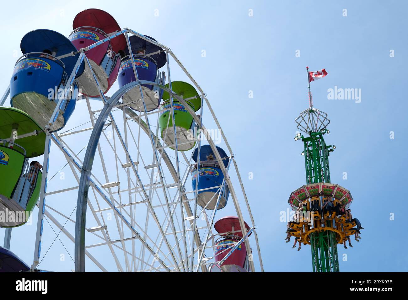 day off people in Vancouver buy drinks ride on swings rides wear cowboy ...