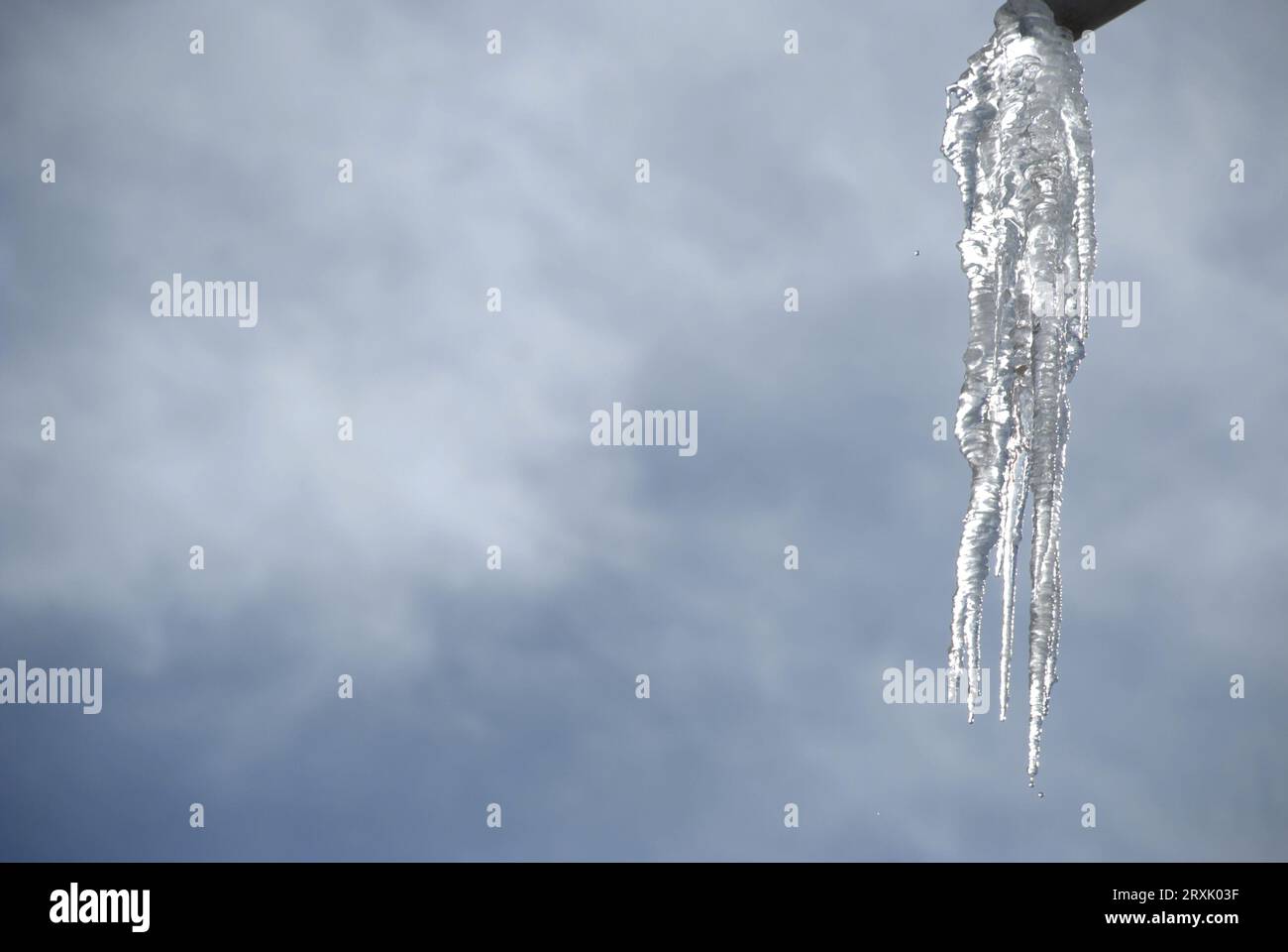 Icicles hanging from pipe hi-res stock photography and images - Alamy