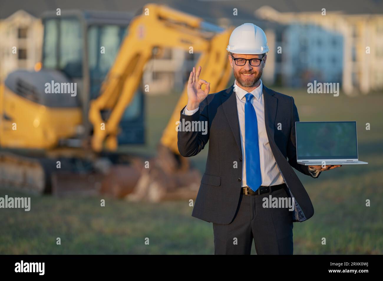 Civil engineer worker at a construction site. Mature engineer worker ...