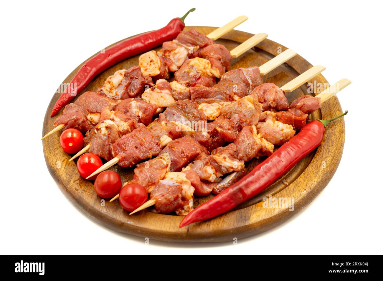 Lamb skewers isolated on white background. Raw lamb skewer with herbs ...