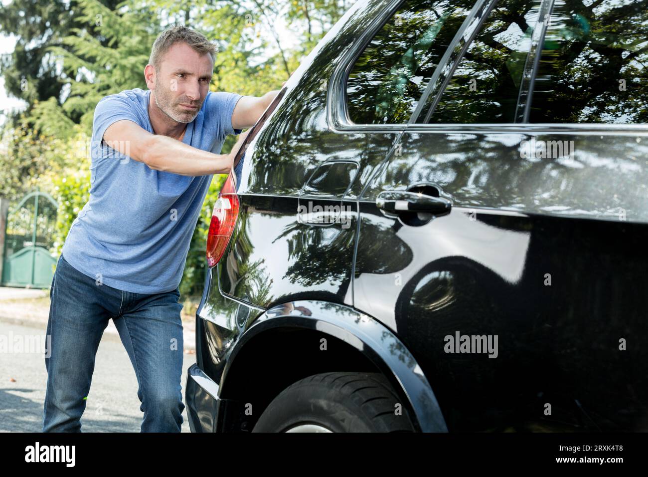 Pushing a broken car hi-res stock photography and images - Alamy