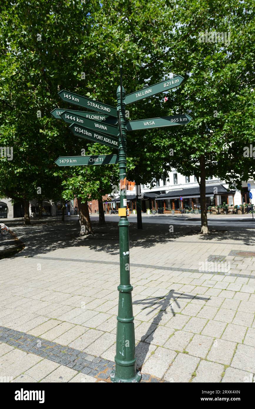 A distance sign at the public square, Stortorget, Malmö, Sweden Stock ...