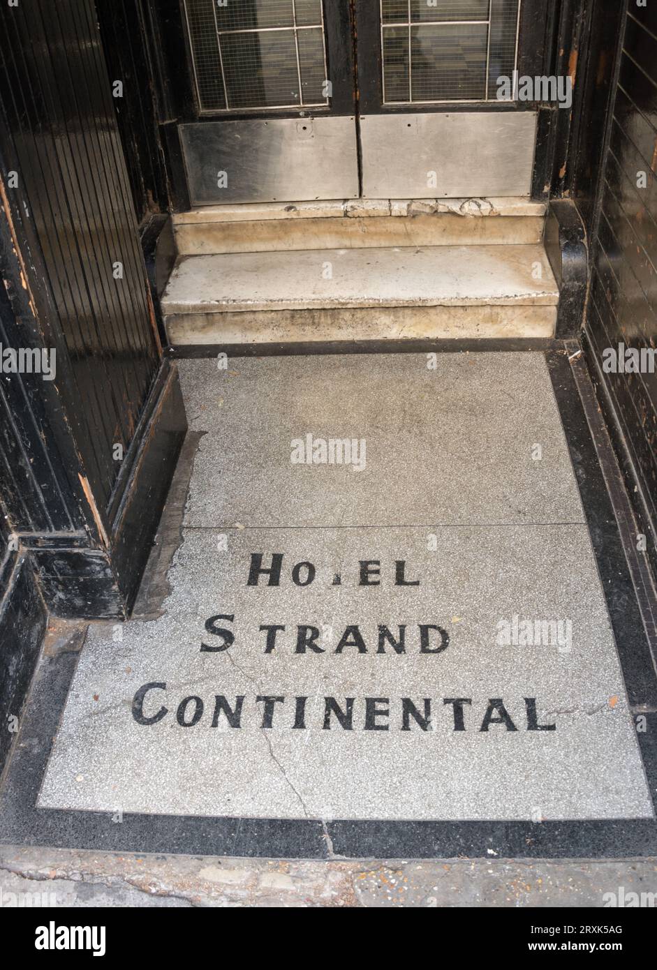 Hotel entrance and doorstep signage at the Strand Continental, The ...