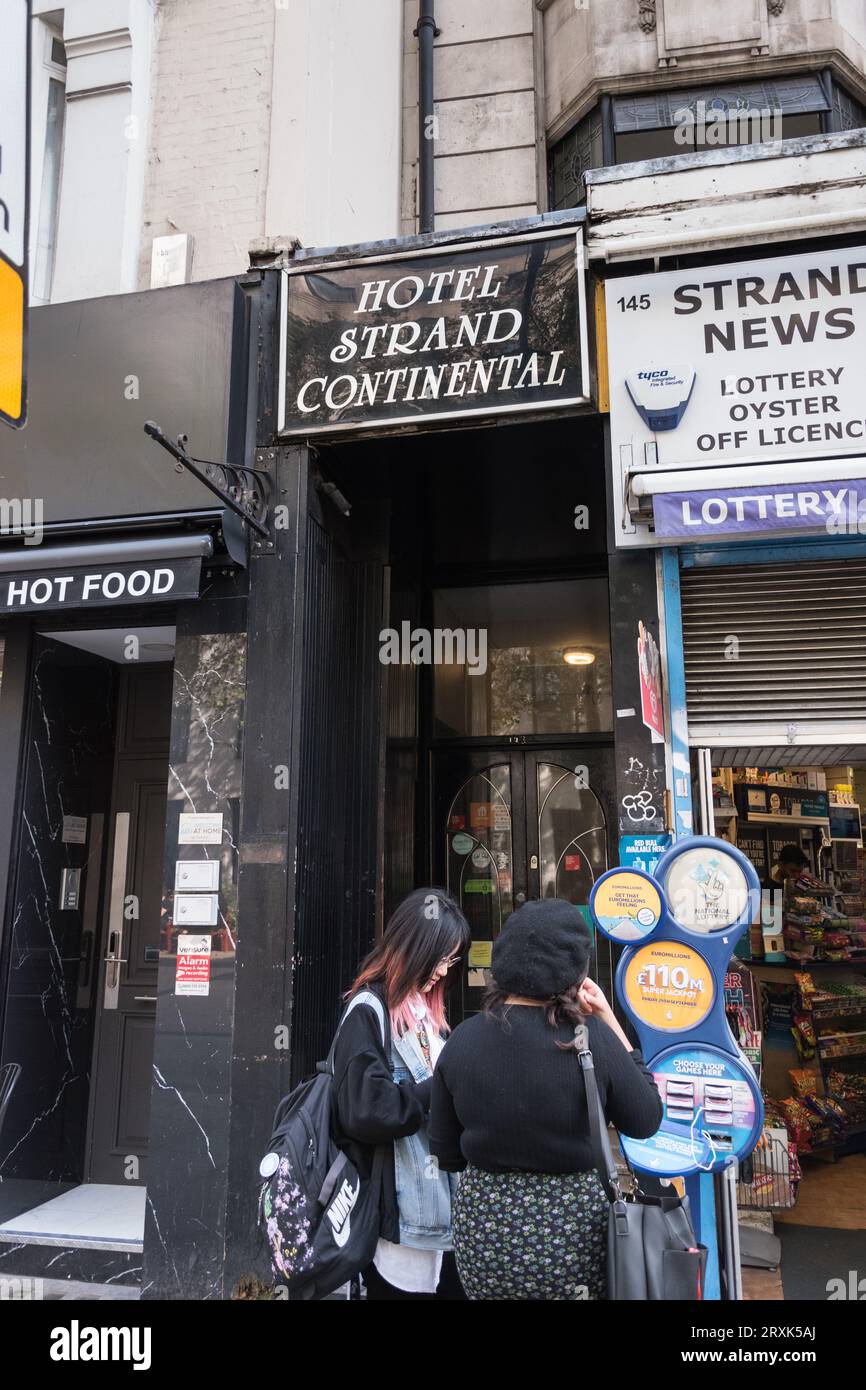 Tourists and hotel signage at Hotel Strand Continental, The India Club ...