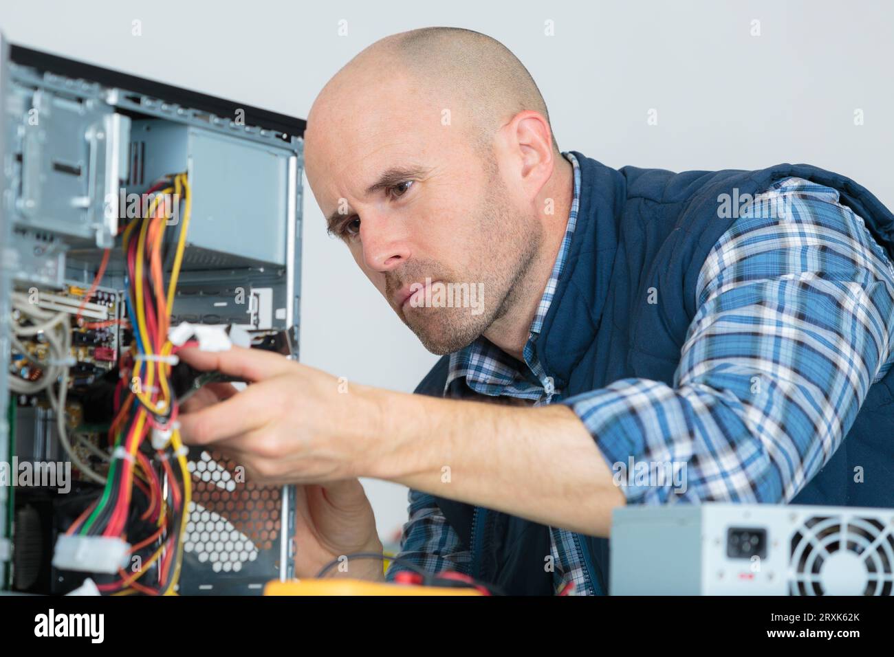 Hands fixing motherboard pc laptop hi-res stock photography and images ...