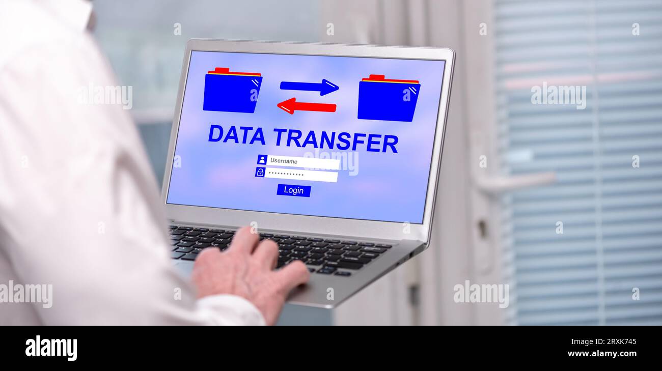 Laptop screen displaying a data transfer concept Stock Photo - Alamy