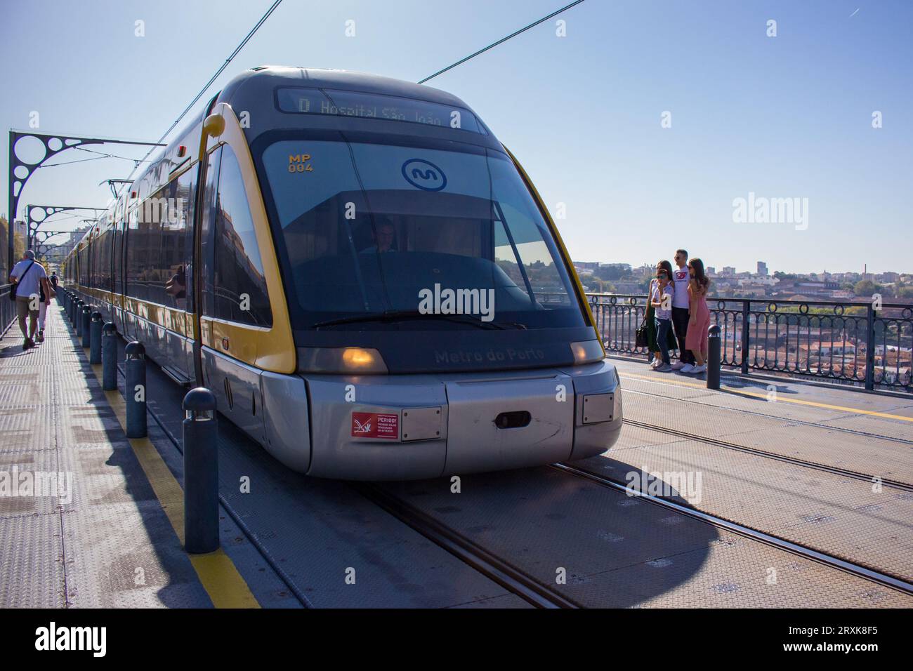 Metro train on famous bridge over river Douro, Porto, Portugal. Public ...