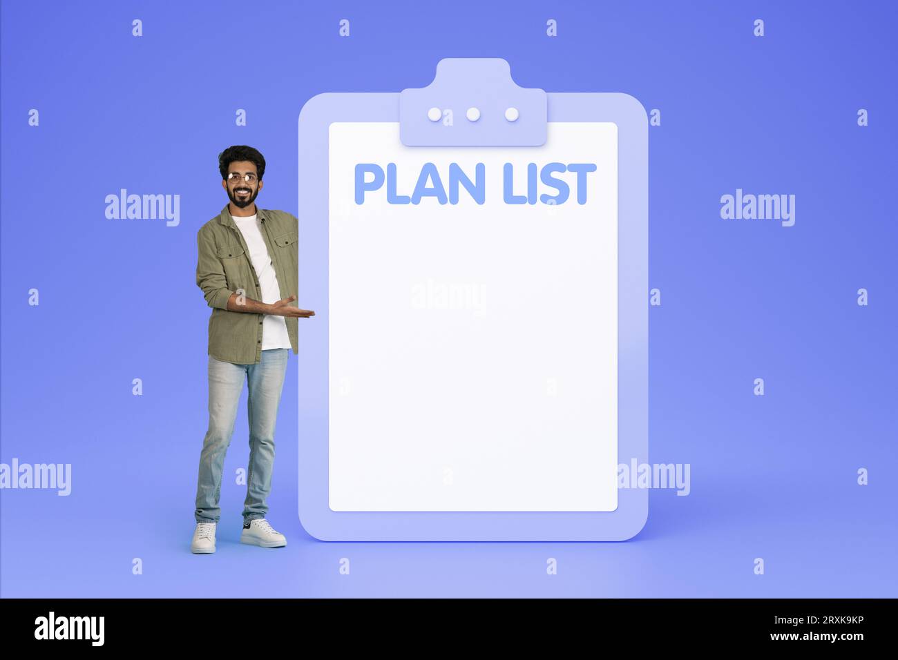 Happy young indian guy in casual point hand on plan list with empty ...