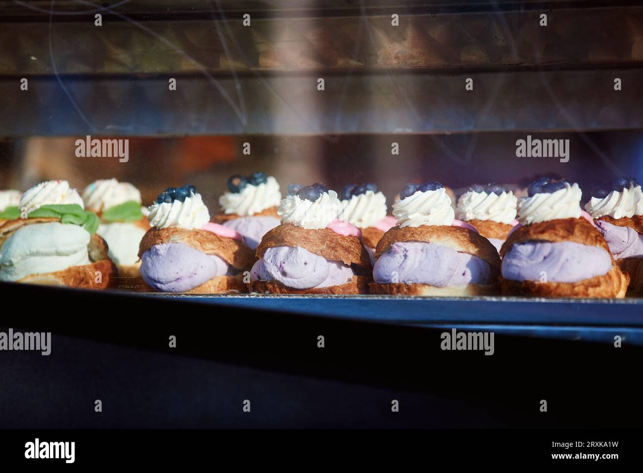 Fastelavnsboller, Danish cream-filled pastries, in shop window Stock ...