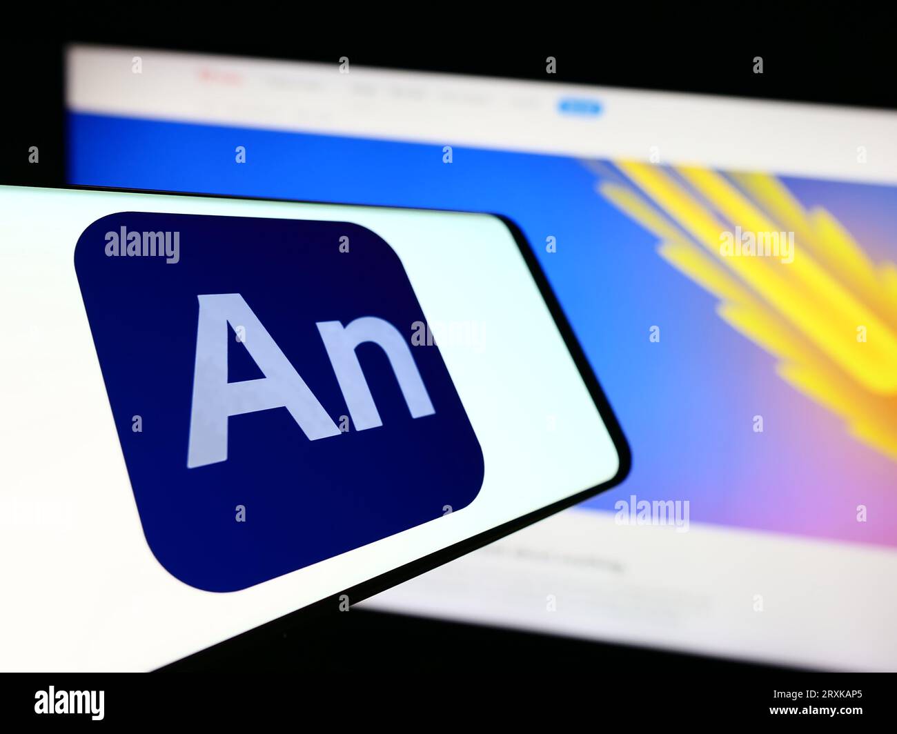 Mobile Phone With Logo Of Computer Animation Software Adobe Animate On Screen In Front Of