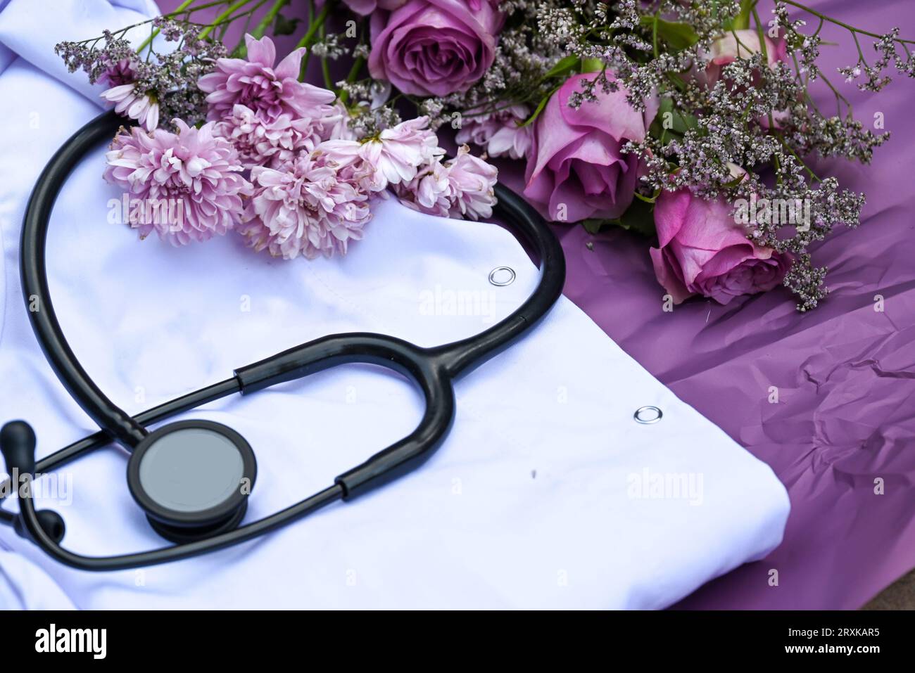 Stethoscope and flowers hi-res stock photography and images - Alamy