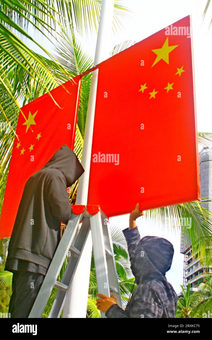 National flags are hung up to welcome the National Day in Sanya City ...