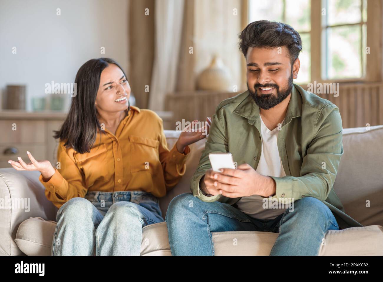 Woman scolding husband hi-res stock photography and images - Alamy