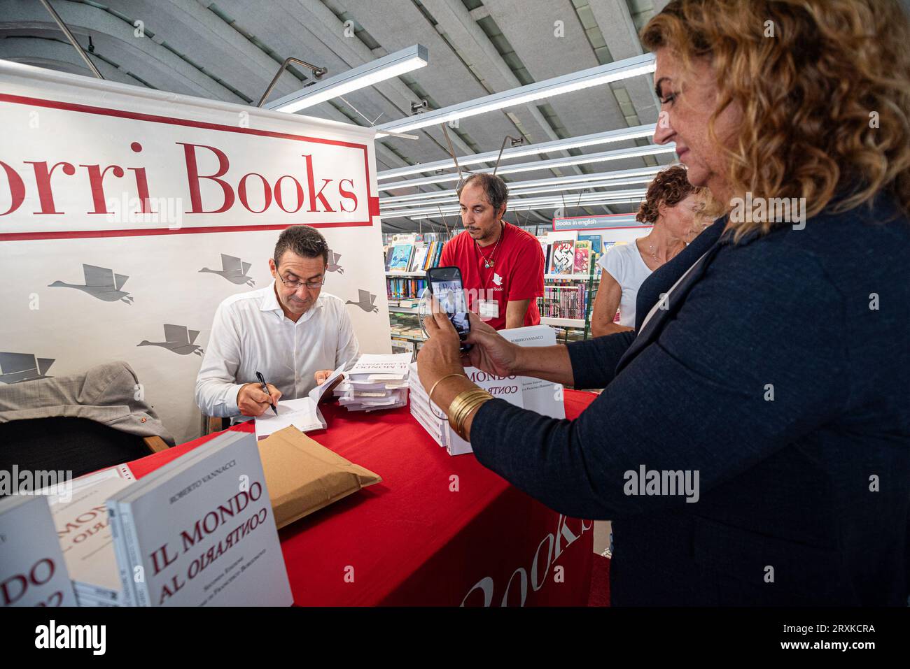 Italian army general Roberto Vannacci signs copies of his controversial ...