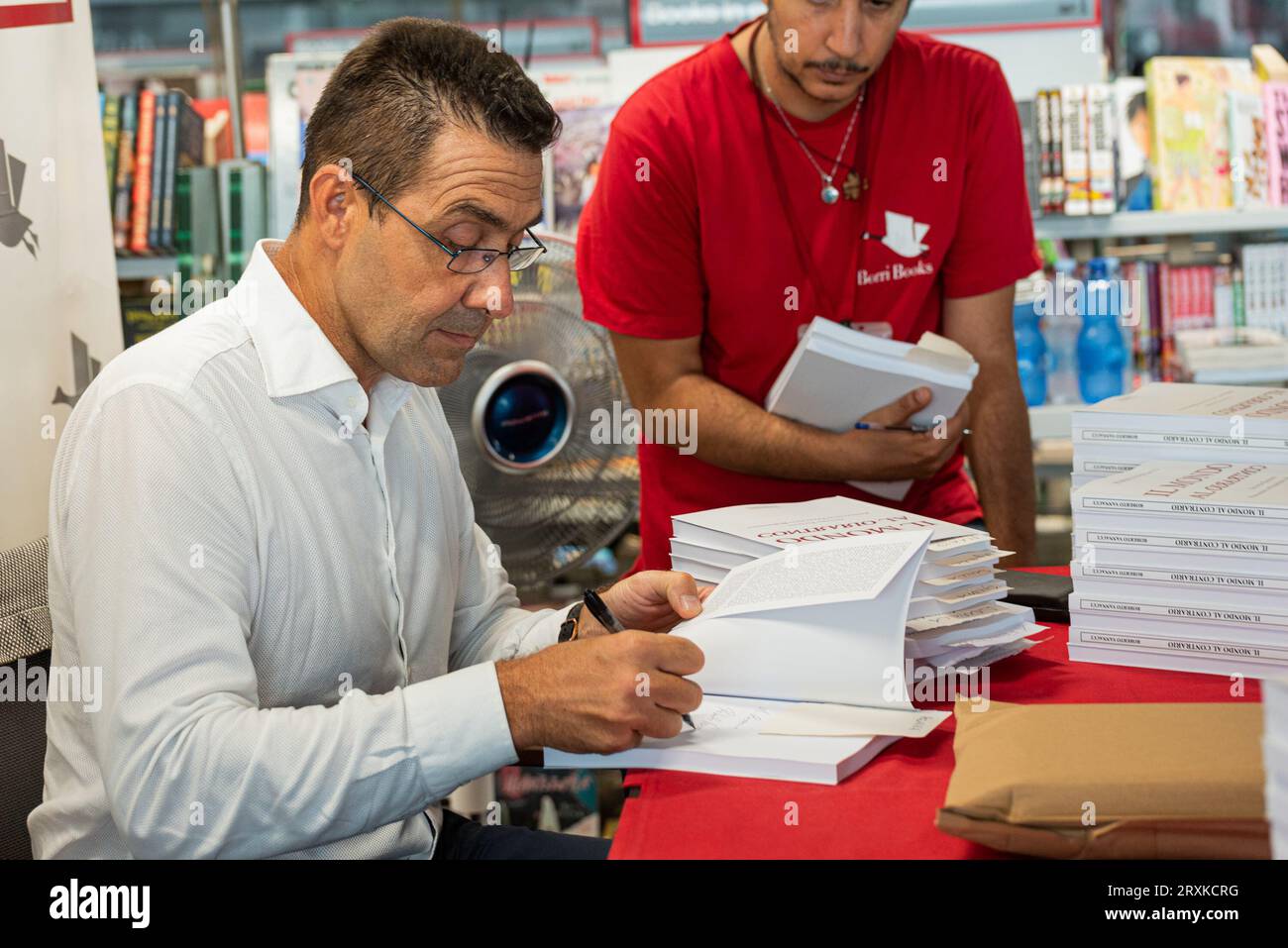 Italian army general Roberto Vannacci signs copies of his controversial ...