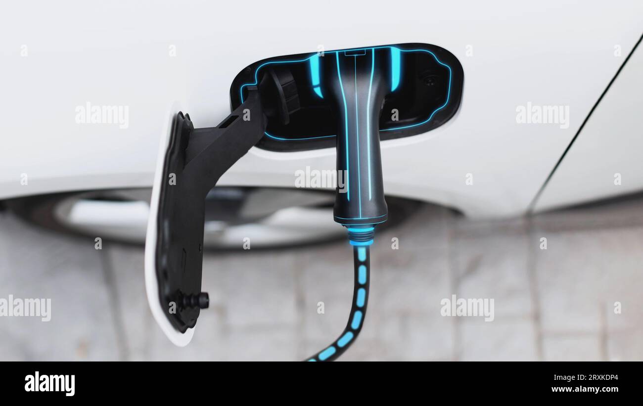 Top view EV charger plugged into electric car for electric recharging ...