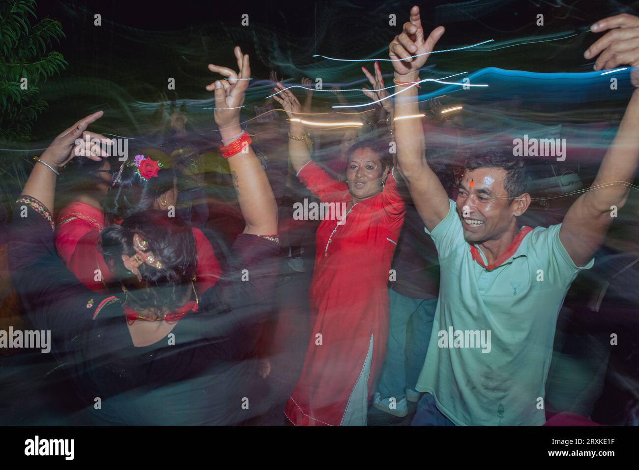 Bhaktapur, Nepal. 22nd Sep, 2023. People dance and celebrate as the ...