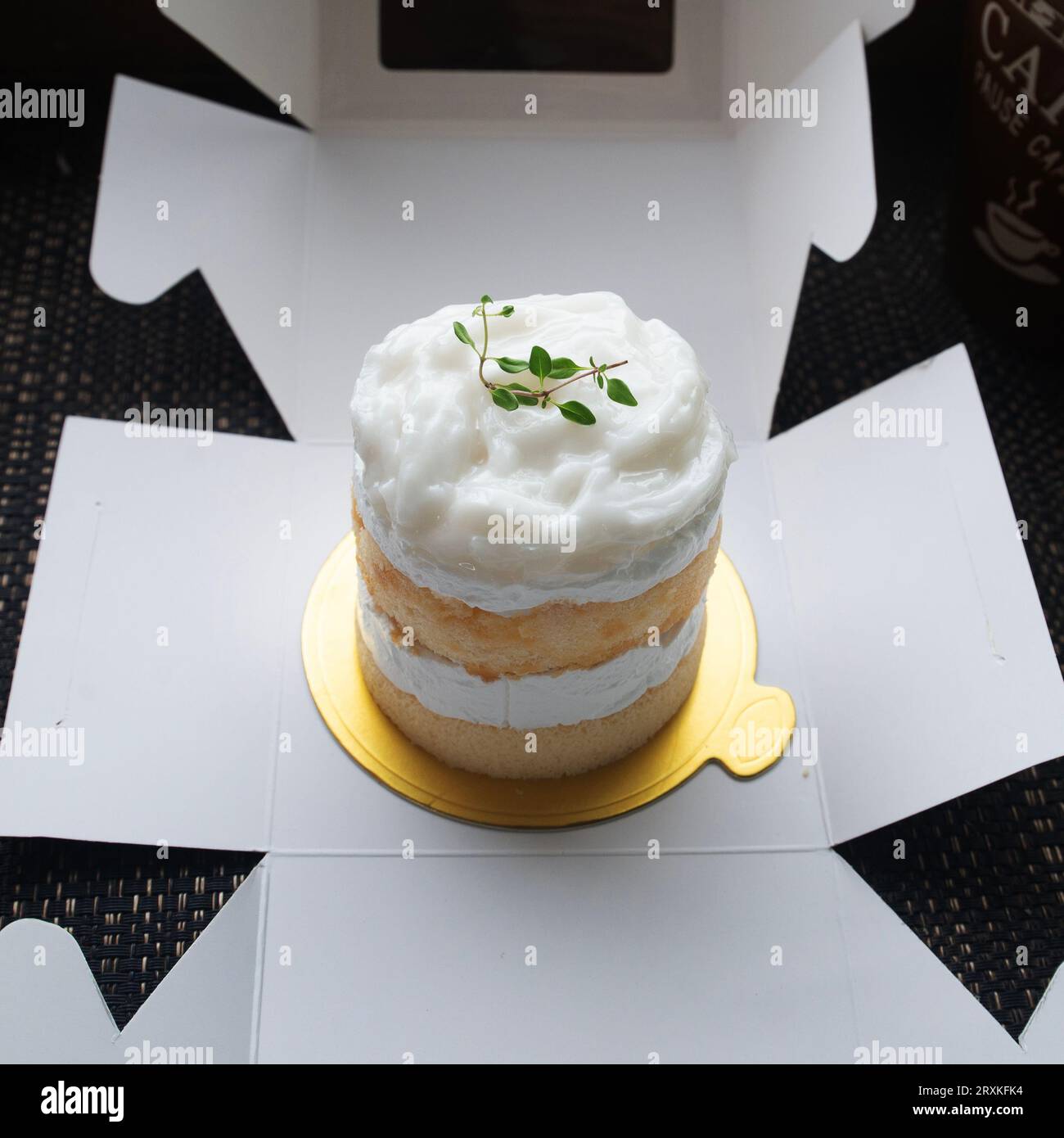 Coconut cake looks delicious placed on cardboard box ready to sending ...