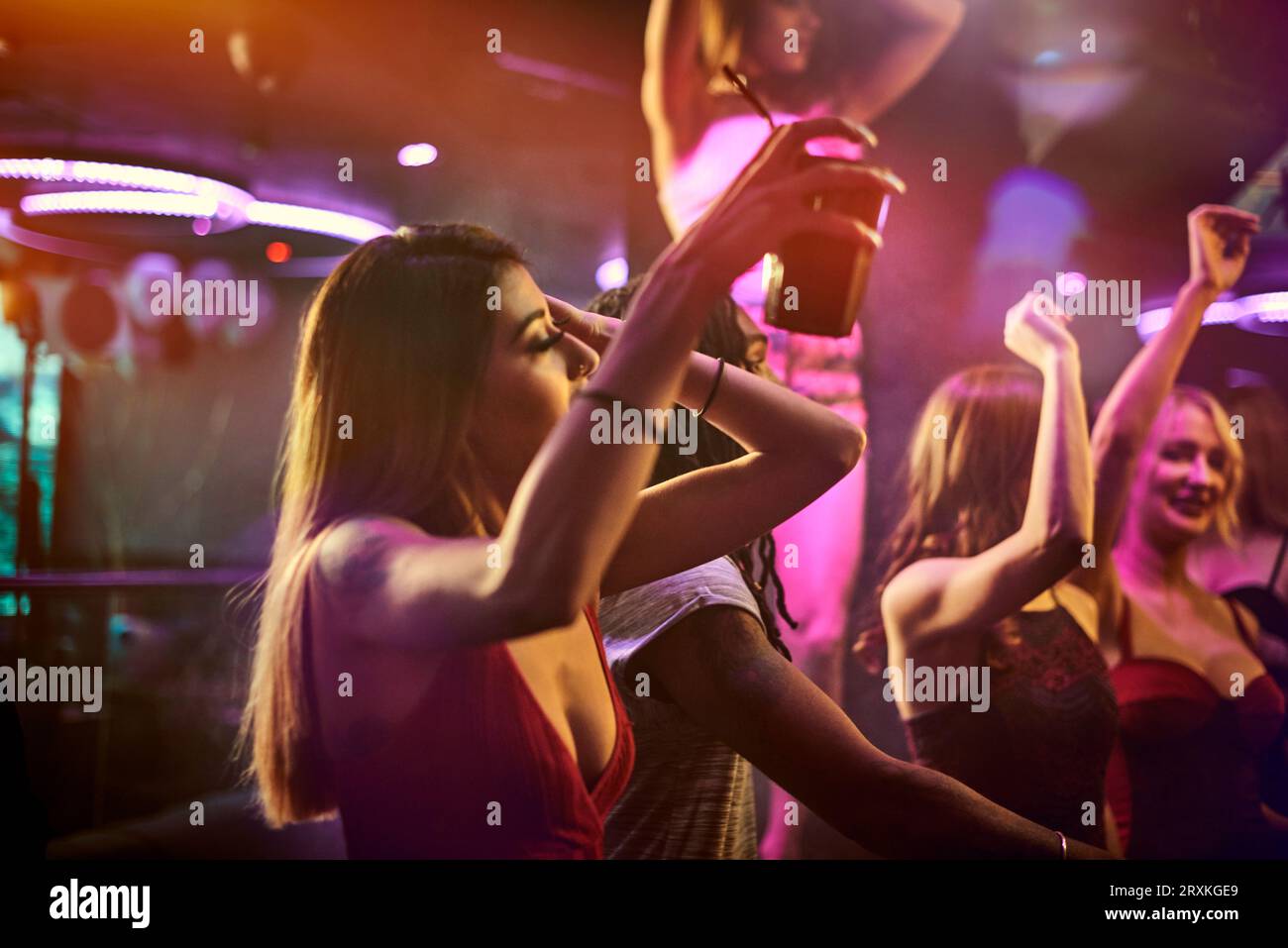 Woman drinking dancing nightclub hi-res stock photography and images ...