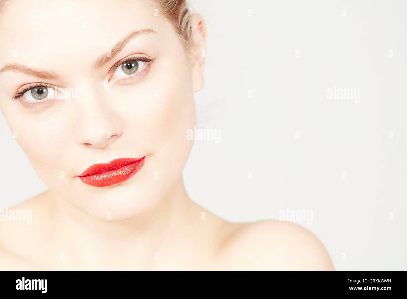 Woman wearing red lipstick hi-res stock photography and images - Alamy