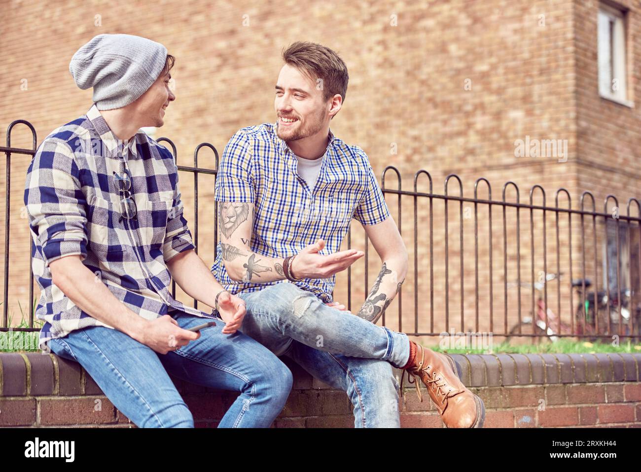 Two boys talking outside hi-res stock photography and images - Alamy
