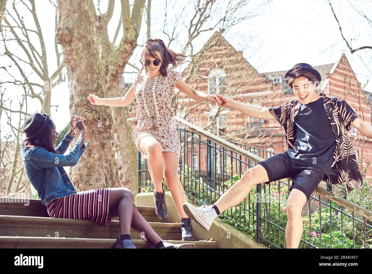 Teen showing off friends hi-res stock photography and images - Alamy