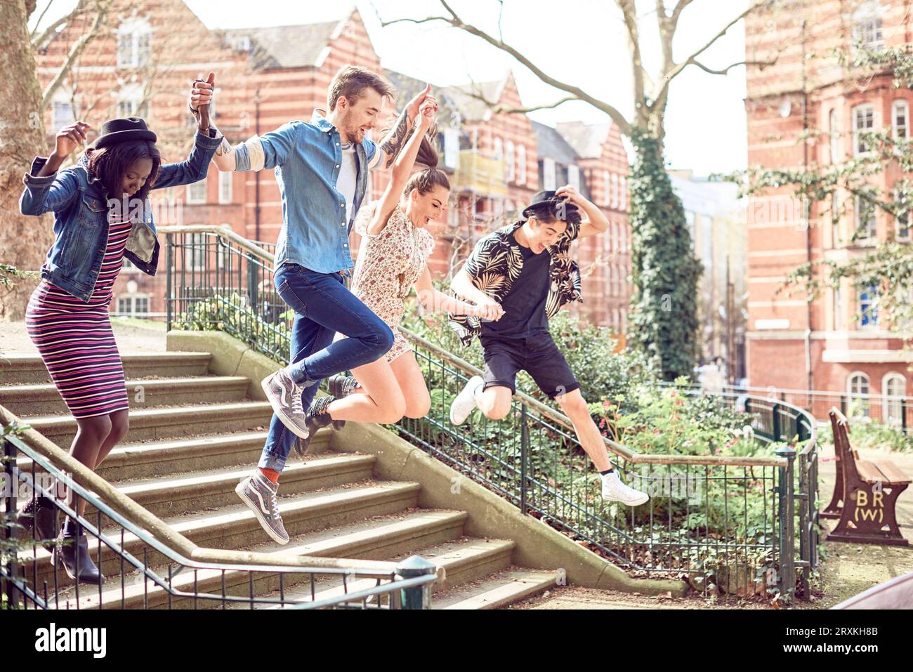 Teenagers jumping steps hi-res stock photography and images - Alamy