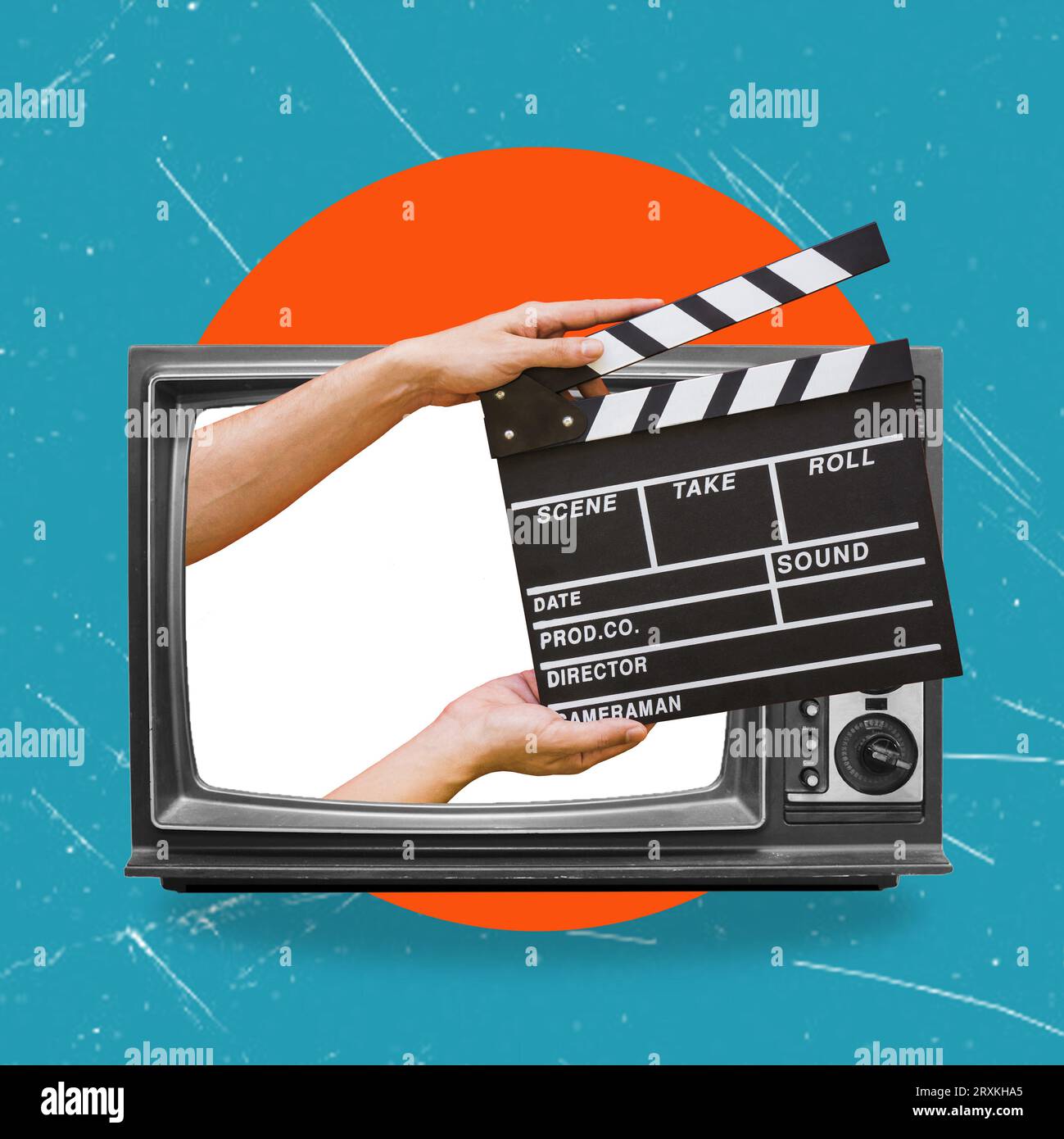 Hands holding a clapper while filming a video movie on TV. A clapper ...